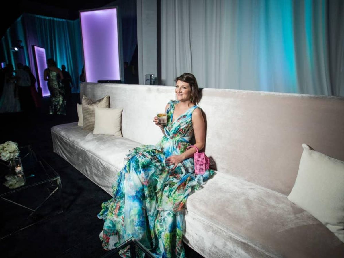 Corinne King relaxes in the lounge area. - CultureMap Fort Worth